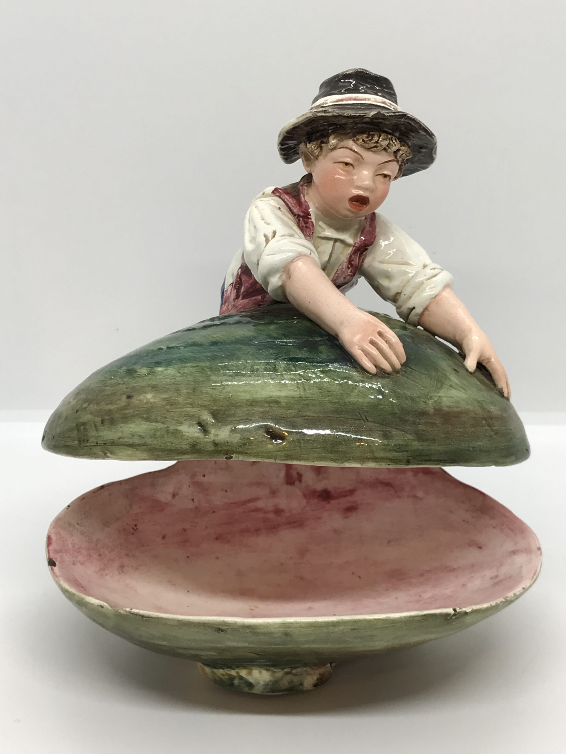 Ceramic Boy holding shell open 18cm high (leg broken off) - Vintage ...