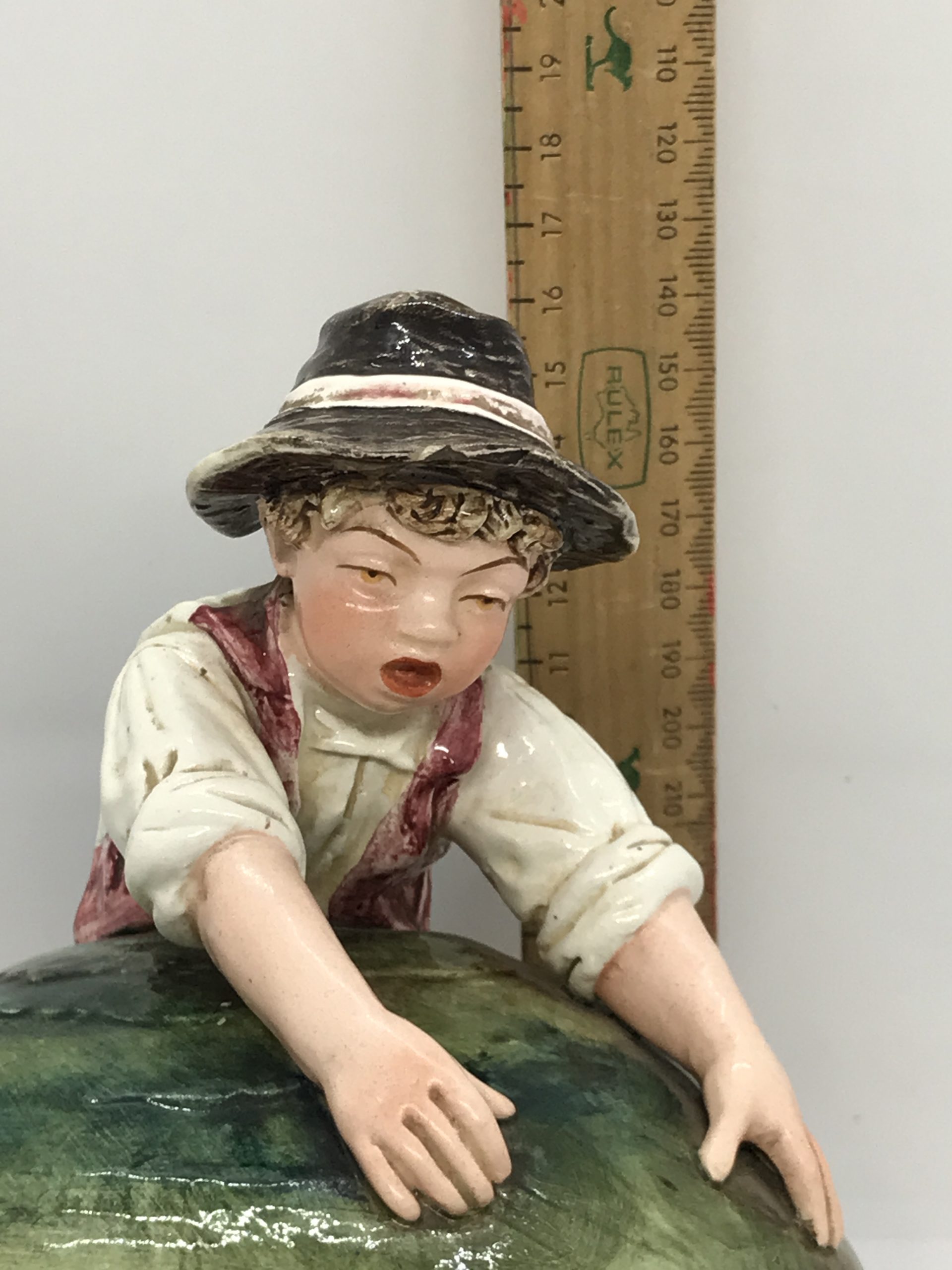 Ceramic Boy holding shell open 18cm high (leg broken off) - Vintage ...