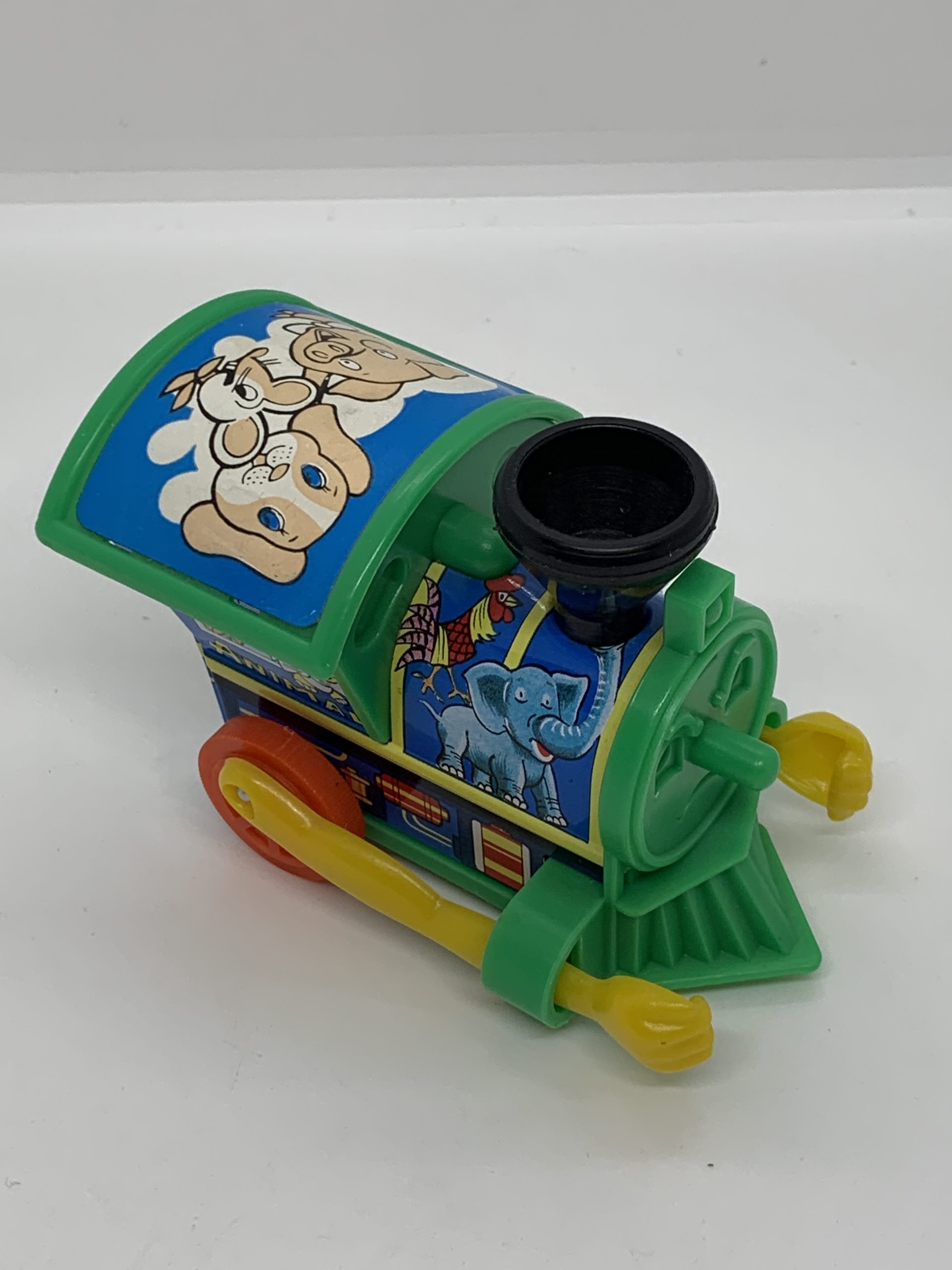 Vintage Yoneya Windup Plastic and Tin toy Train - Vintage Keepsakes