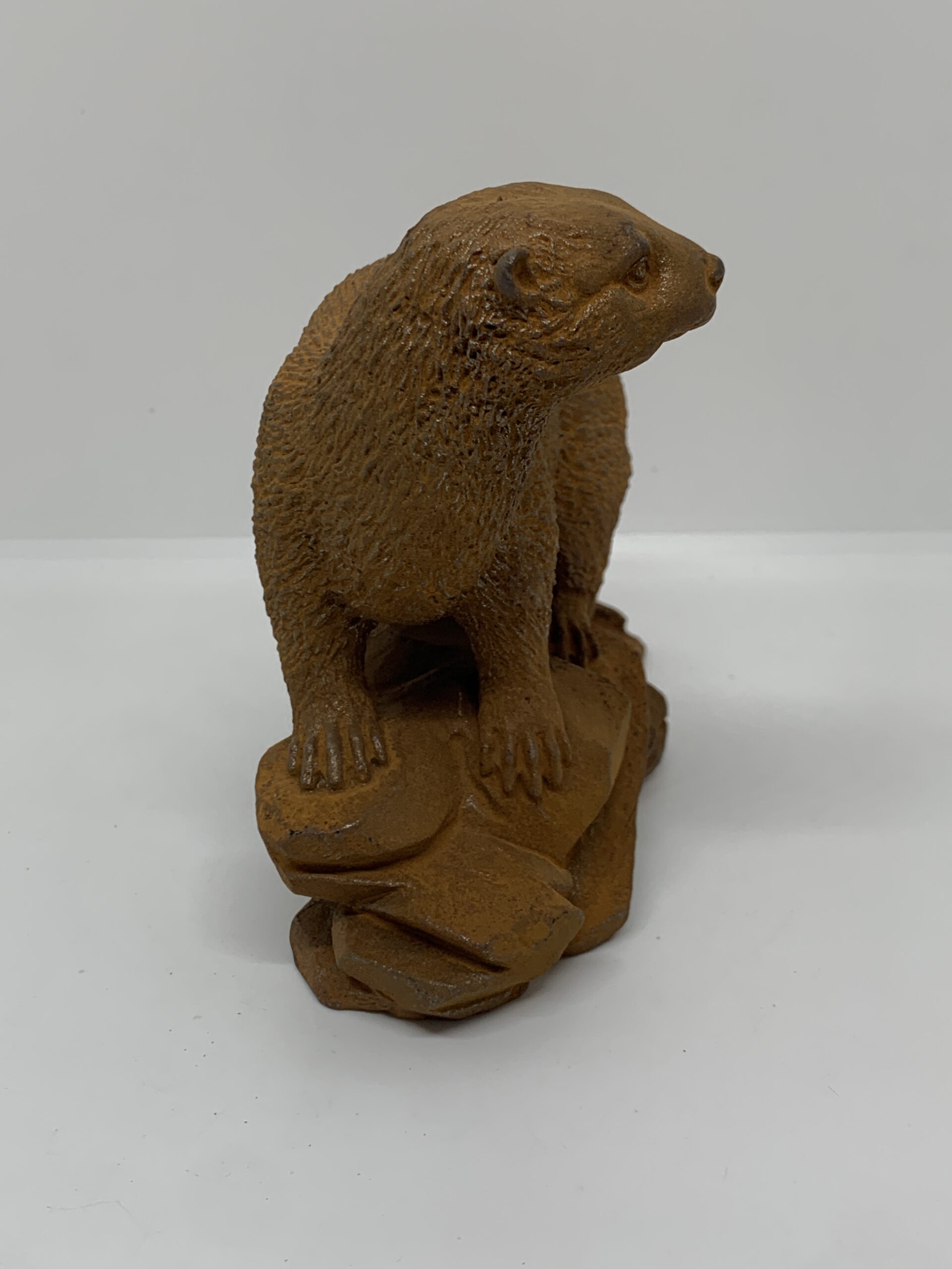Rusty Cast Iron Otter on Rock 16cm high - Vintage Keepsakes