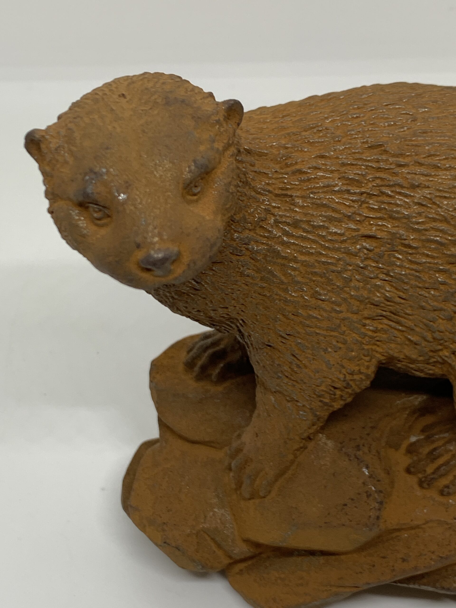 Rusty Cast Iron Otter on Rock 16cm high - Vintage Keepsakes