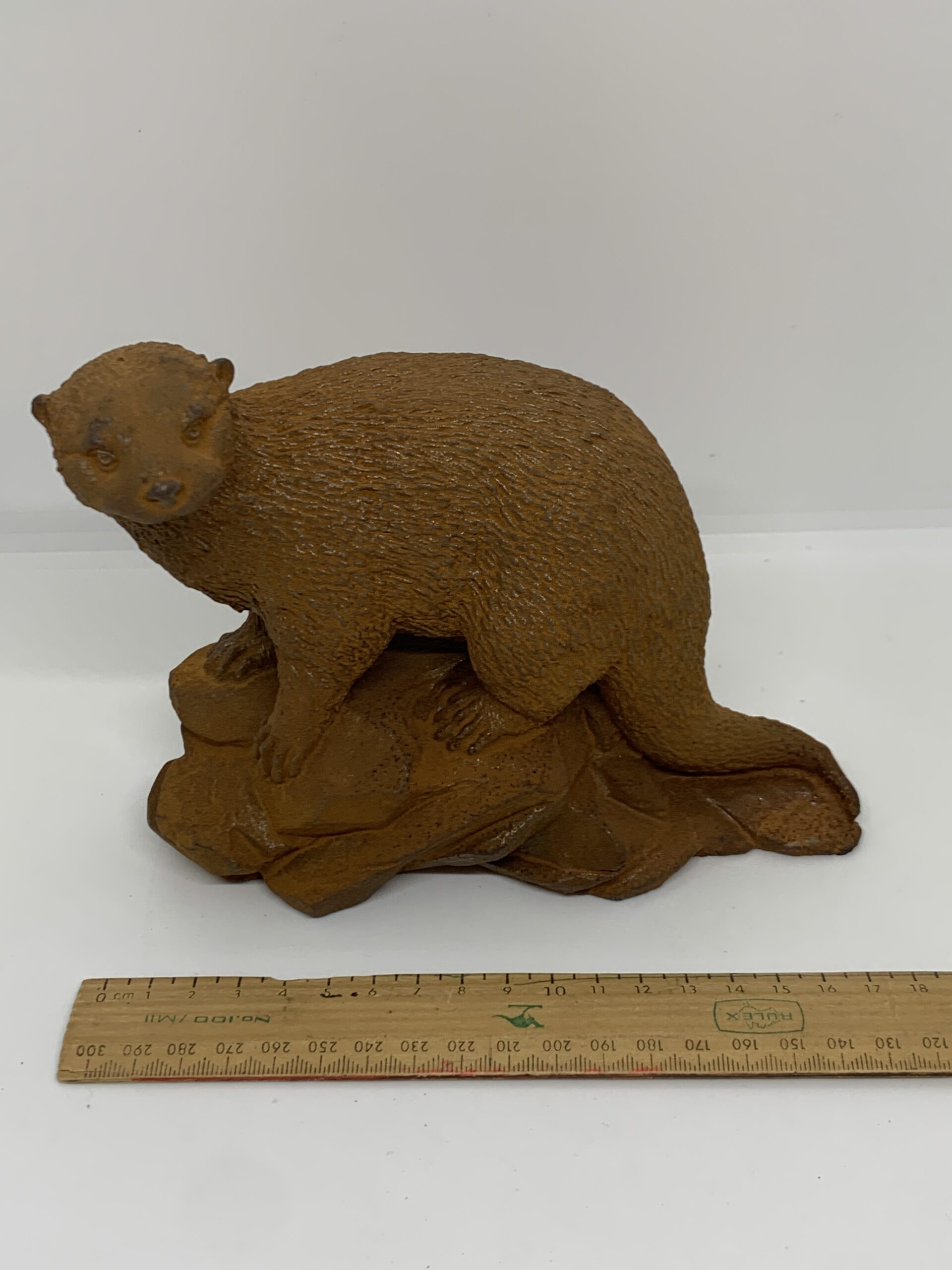 Rusty Cast Iron Otter on Rock 16cm high - Vintage Keepsakes