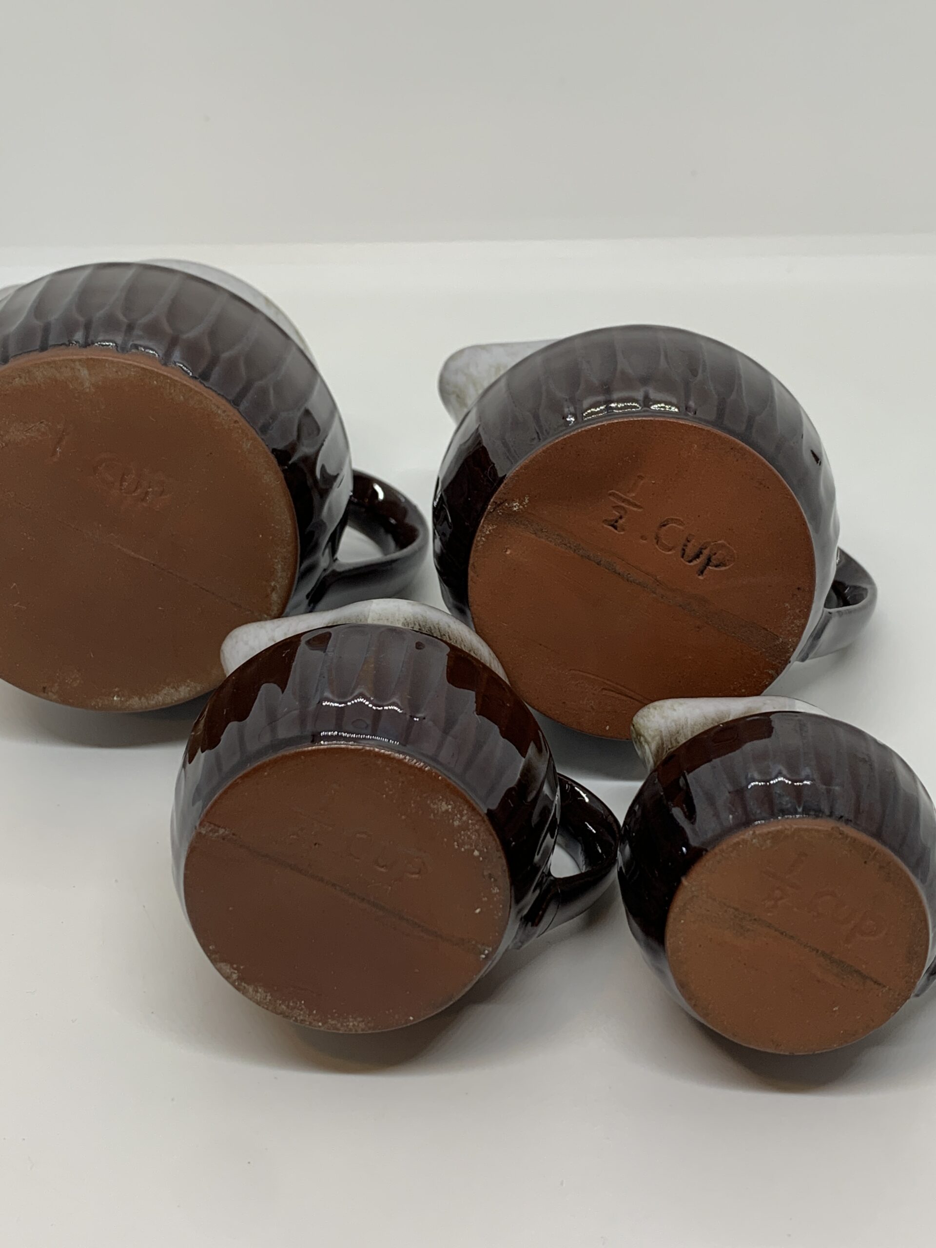 Set of 4 Pottery Graduated Measuring Jugs - Vintage Keepsakes