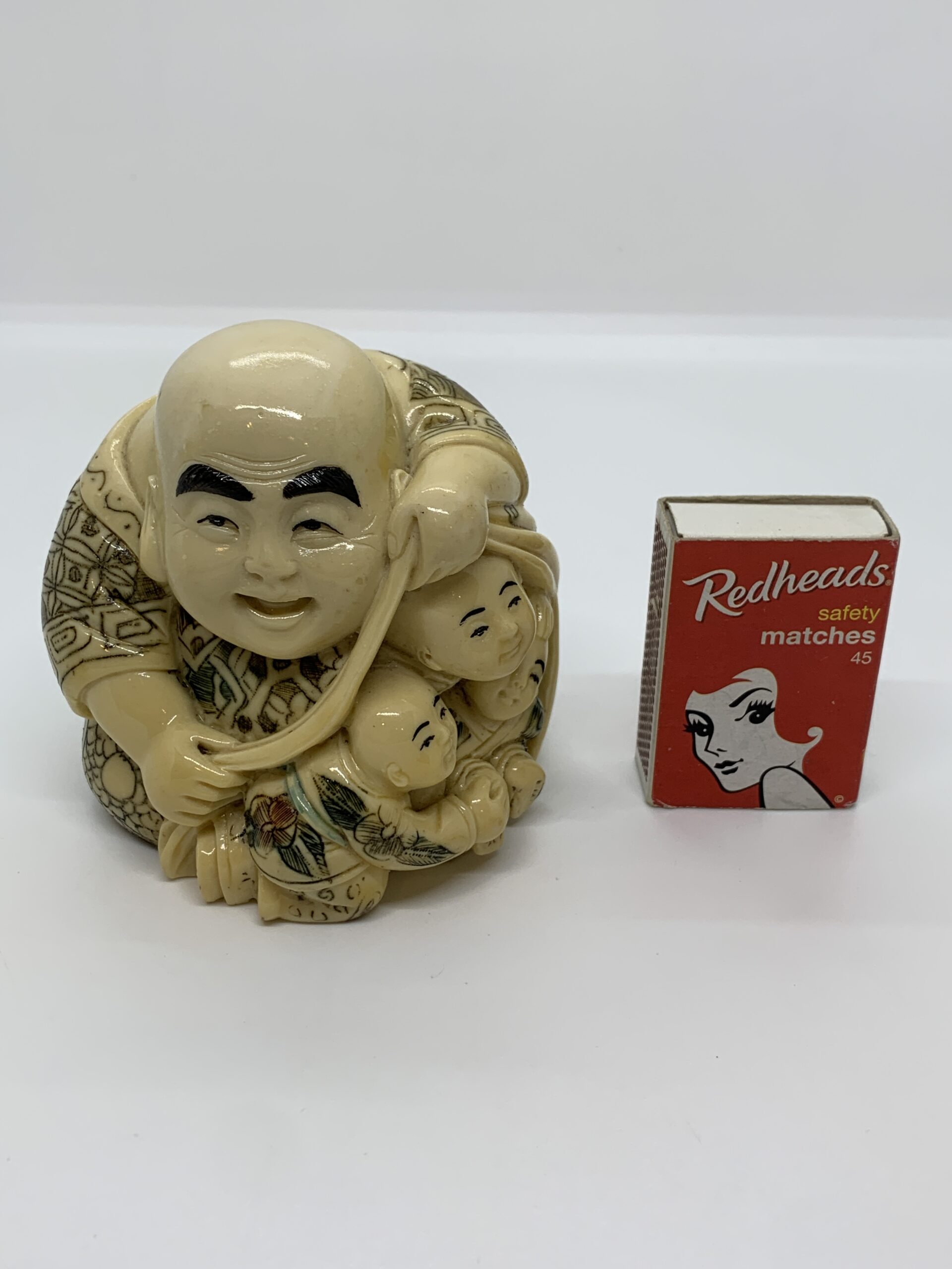 Inked Resin Buddha Hiding Children (hand painted and marked to base ...