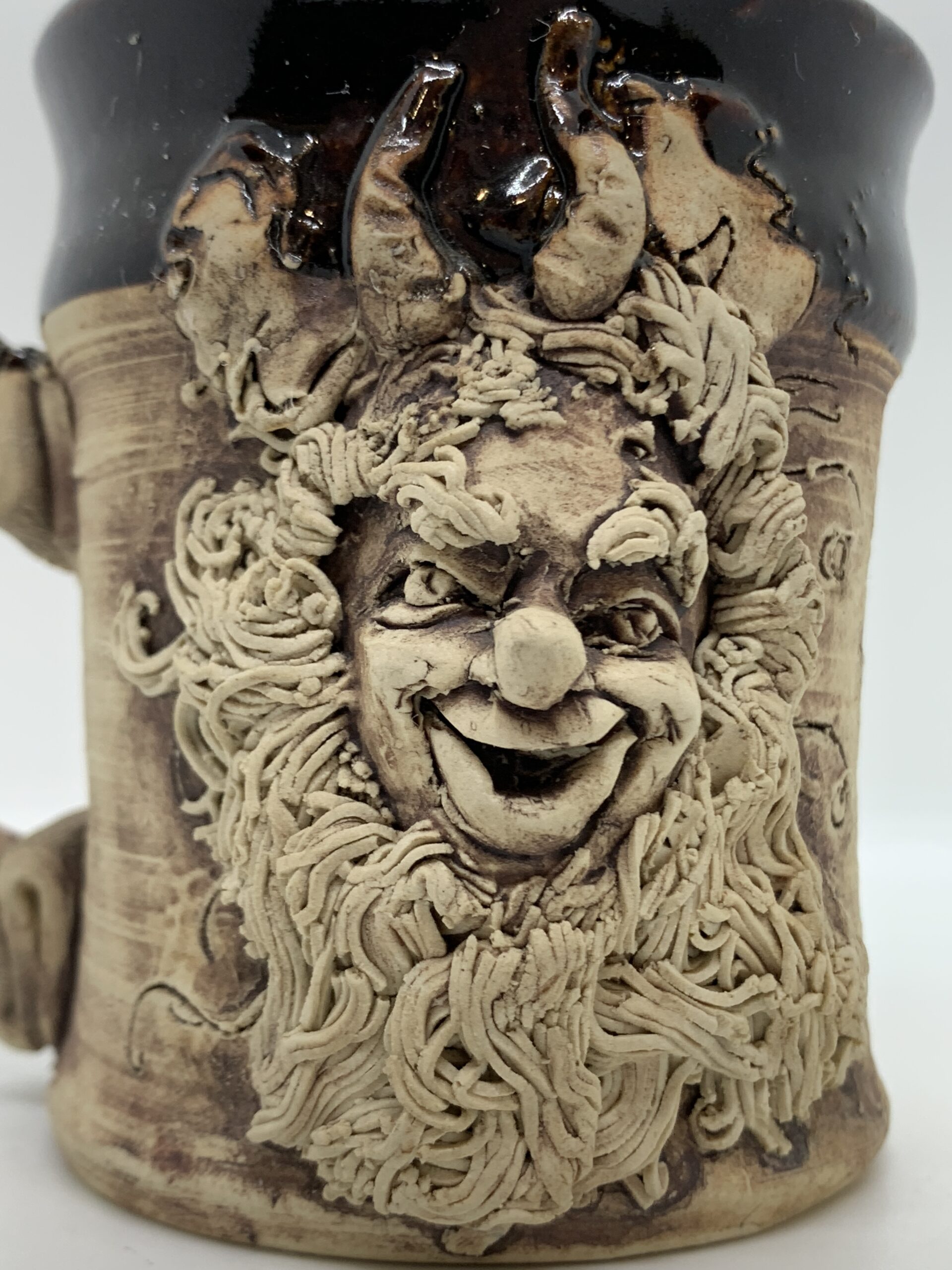 Pottery with Devil Faced Design Mug (incised mark to bottom) 10cm ...